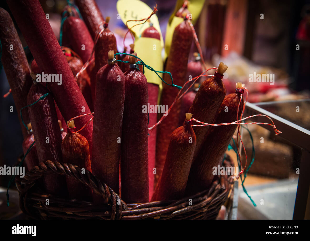Selection of different types of salami on display Stock Photo - Alamy
