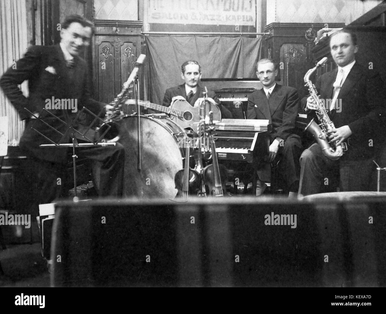 This image features various musical instruments, including a saxophone ...