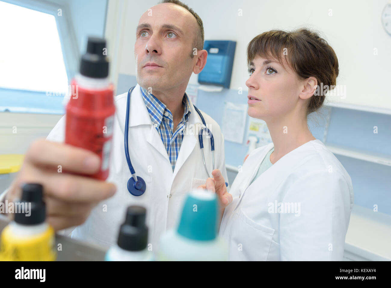 doctors checking medicine Stock Photo - Alamy