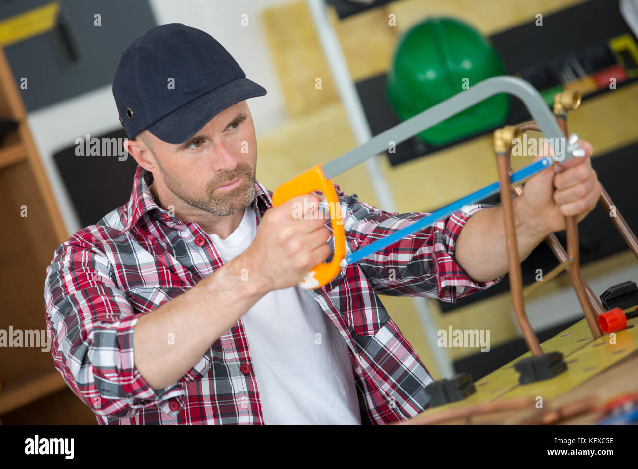 Male cuts pipe hi-res stock photography and images - Alamy