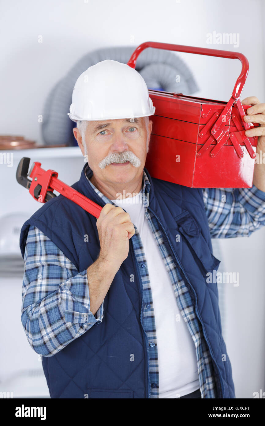 Employee worker uniform older hi-res stock photography and images - Alamy