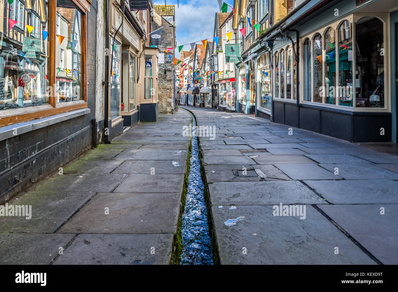 Stream running down medieval Cheap Street in Frome Stock Photo - Alamy