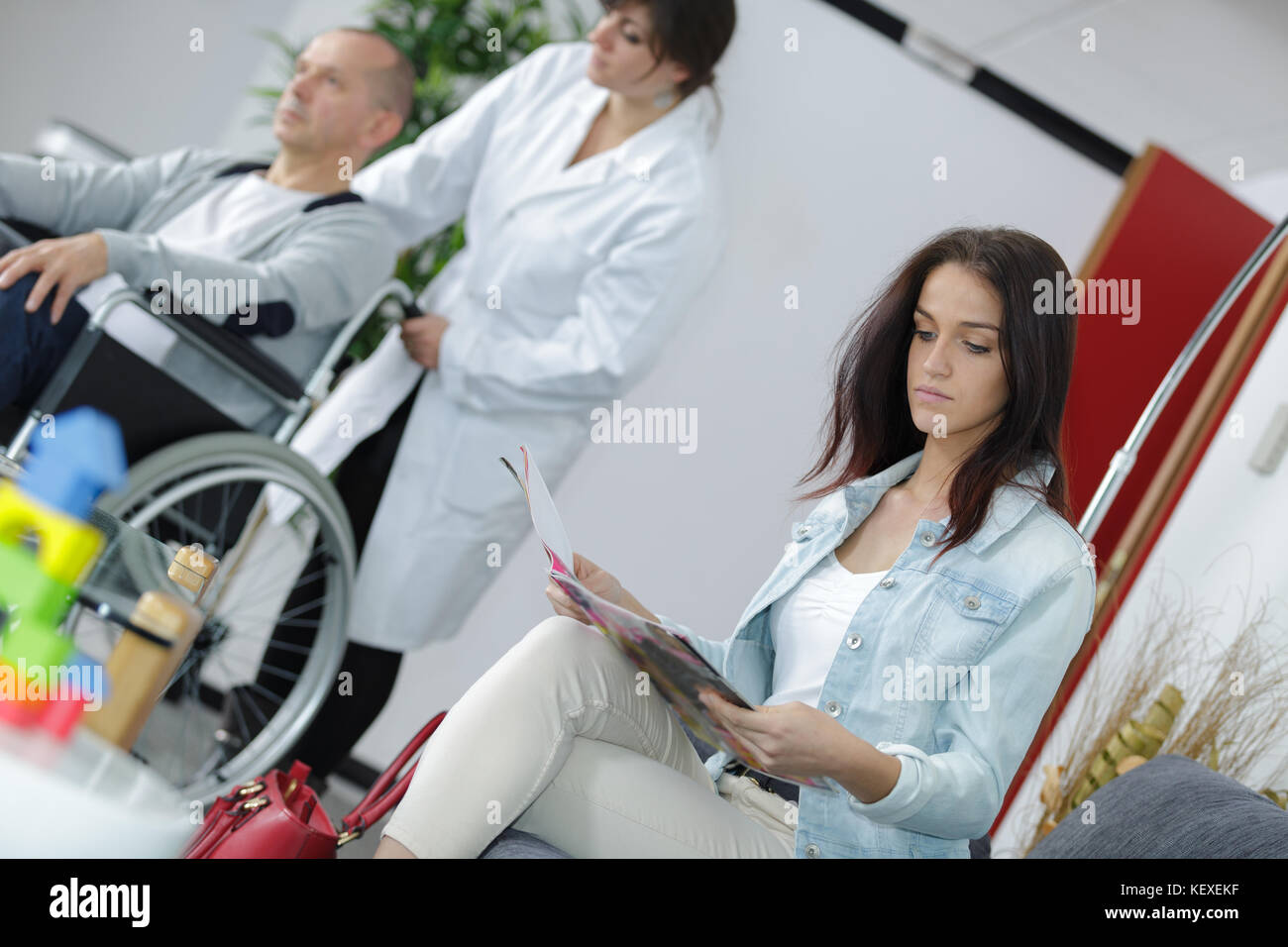 female waiting in hospital waiting room Stock Photo - Alamy