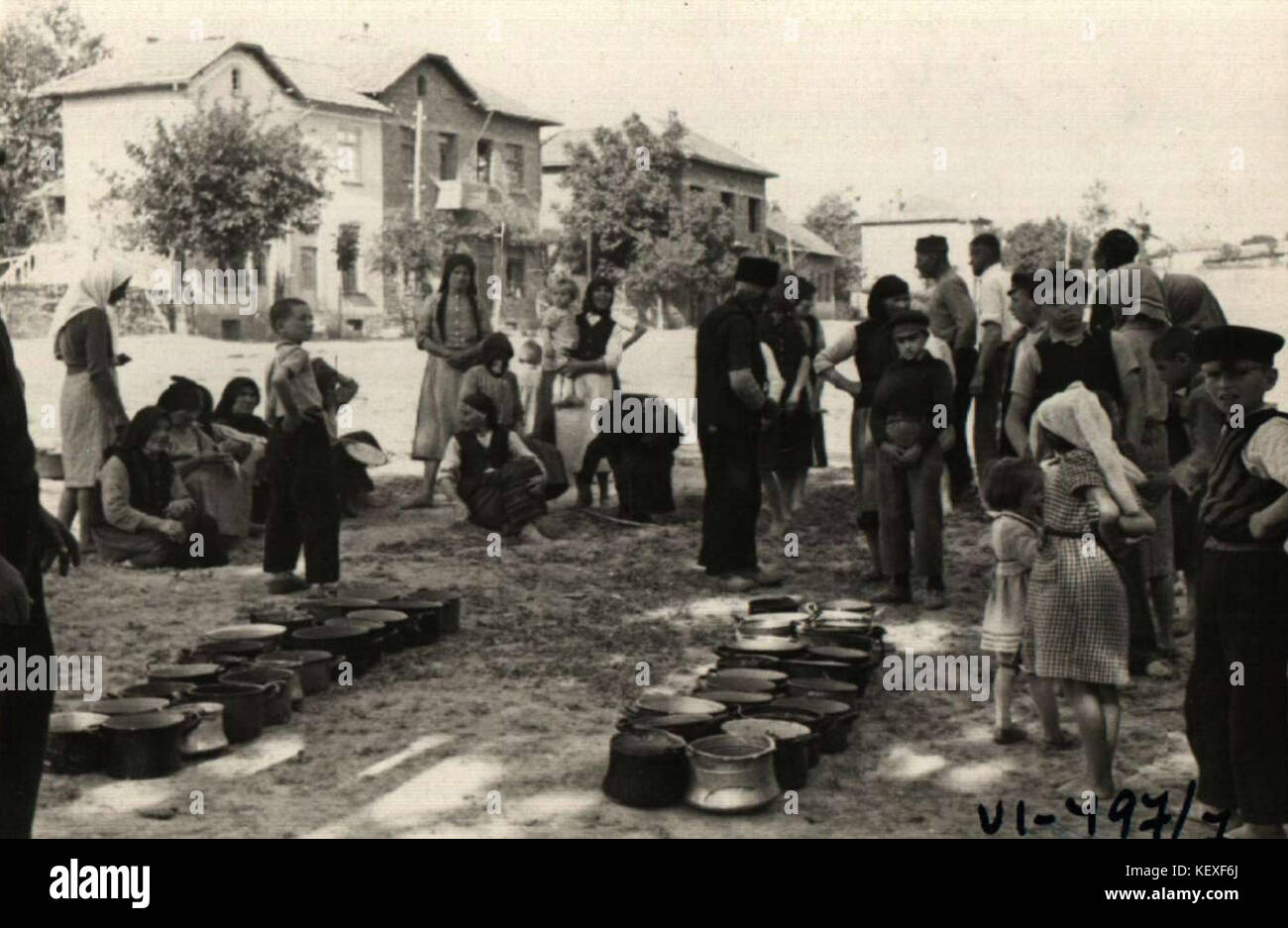 Image of workers handling resin in a manufacturing environment, likely ...