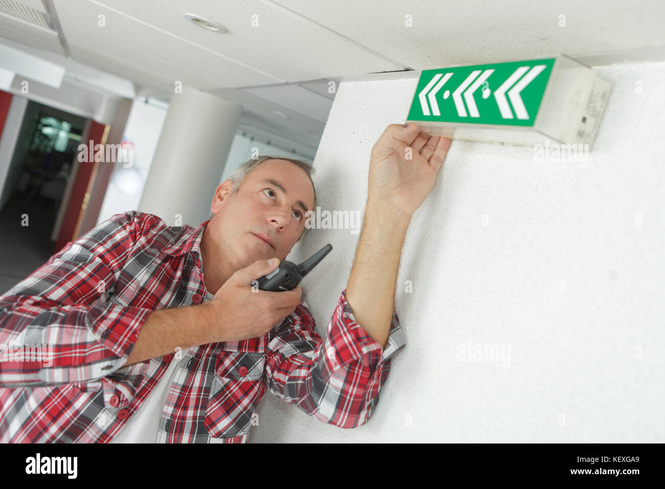 technician fixing a sing Stock Photo - Alamy