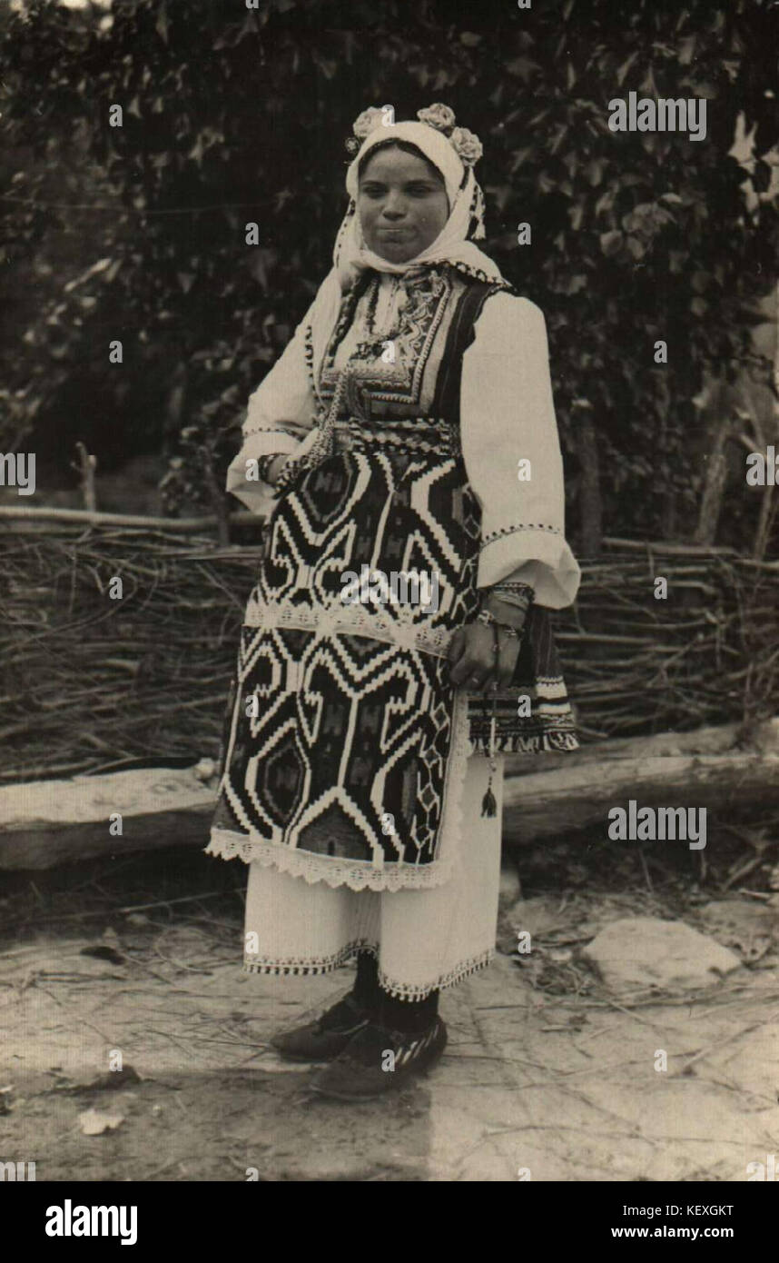 A photograph of a *national costume* from *Macedonia*, highlighting ...