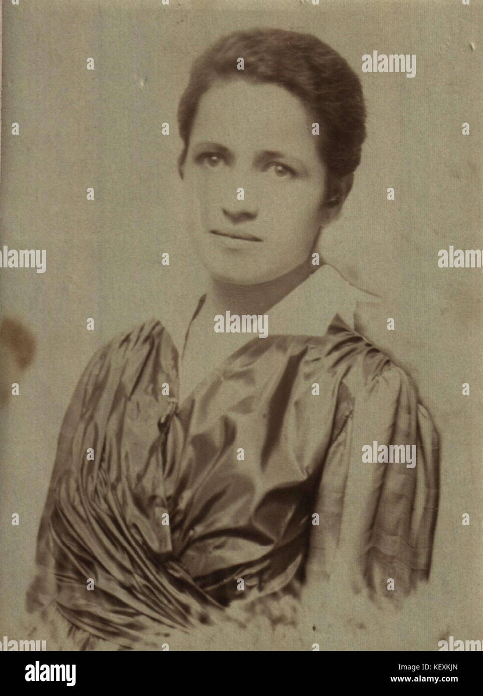 A photograph of Marta Popova, showing her in a moment of candid ...