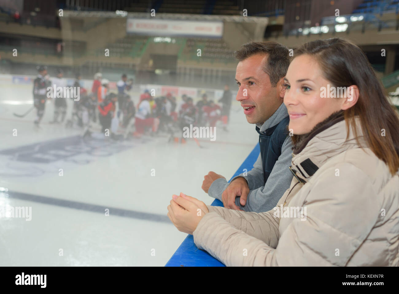 Spectators at ice rink Stock Photo - Alamy