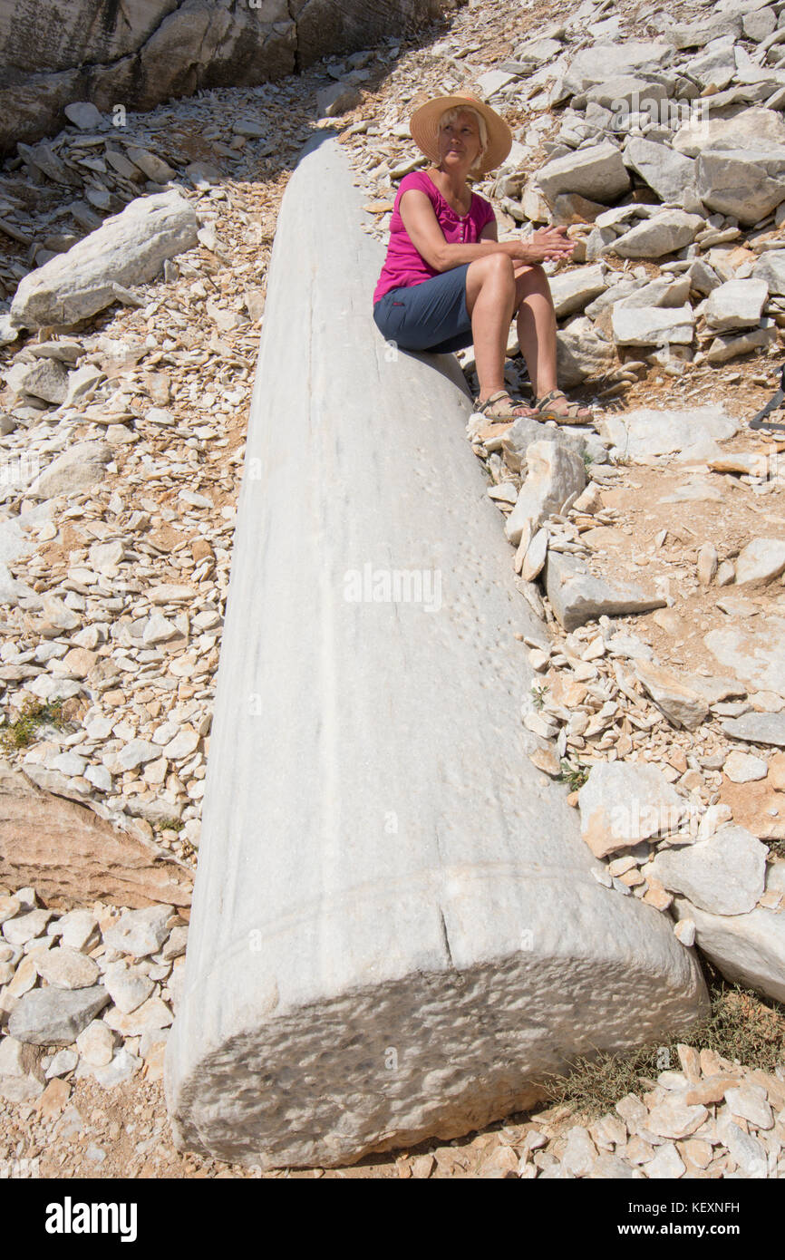 Discarded column in the ancient marble quarry on the promontory at ...
