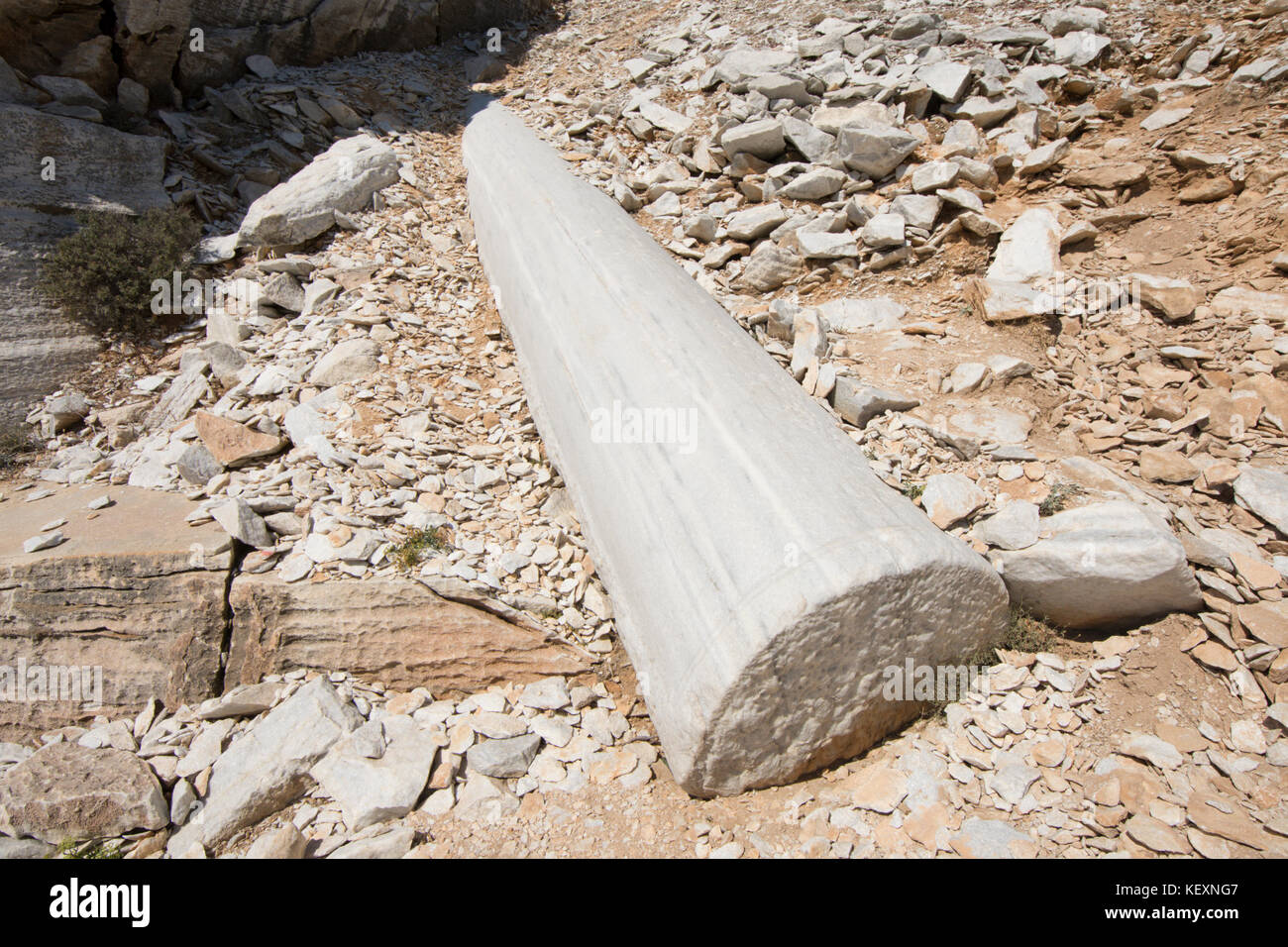 Discarded column in the ancient marble quarry on the promontory at ...