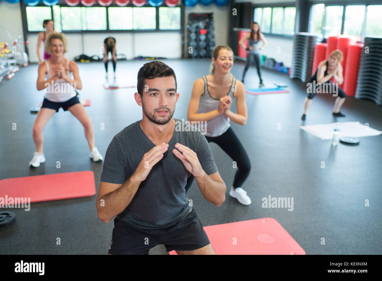 group of people making exercises Stock Photo - Alamy