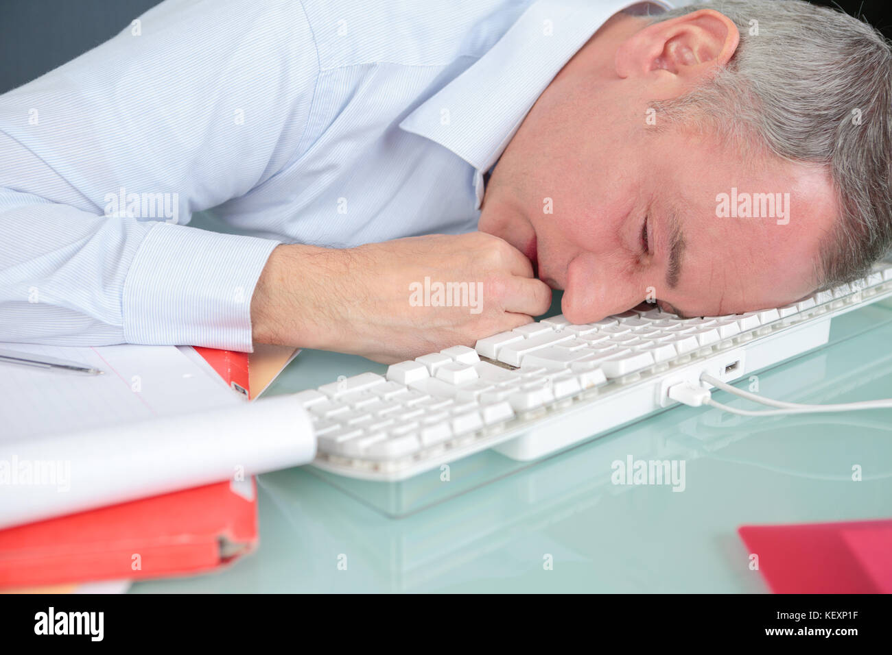 businessman sleeping in office Stock Photo - Alamy