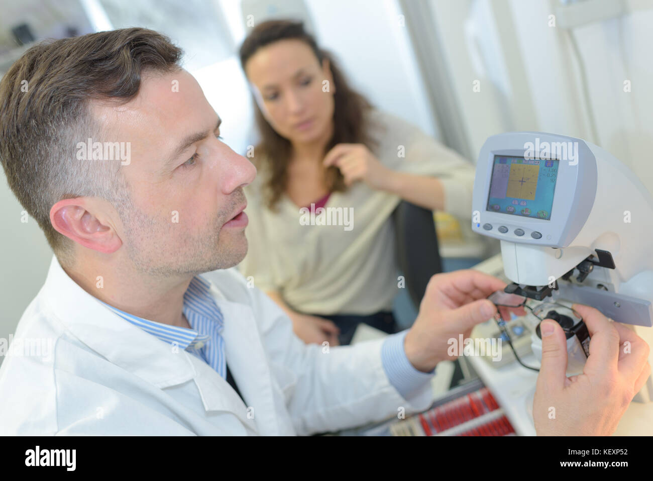 ultrasound machine doctors hand usg investigation Stock Photo - Alamy