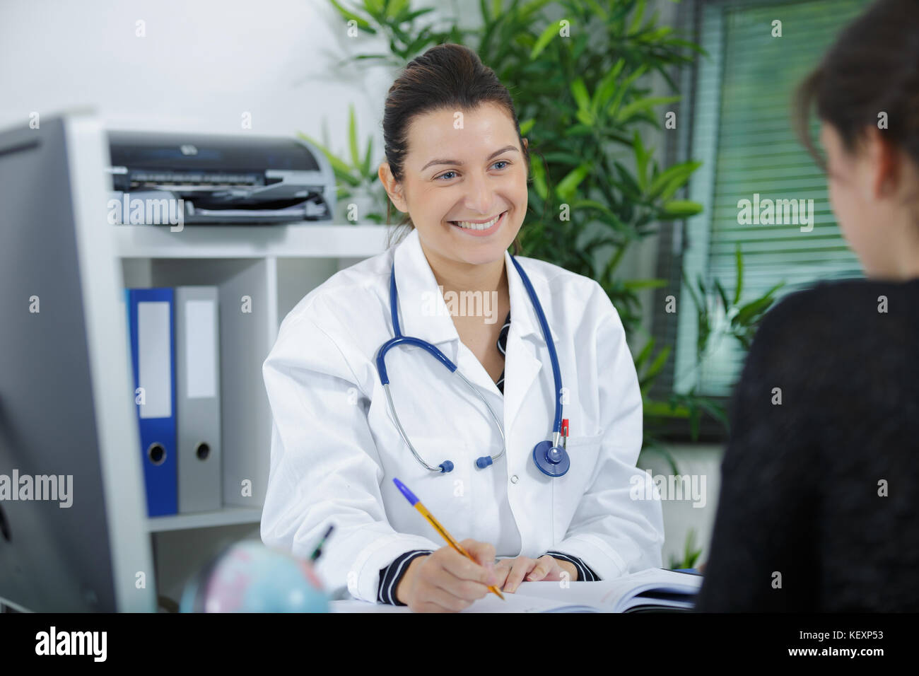 having a doctors appointment Stock Photo - Alamy