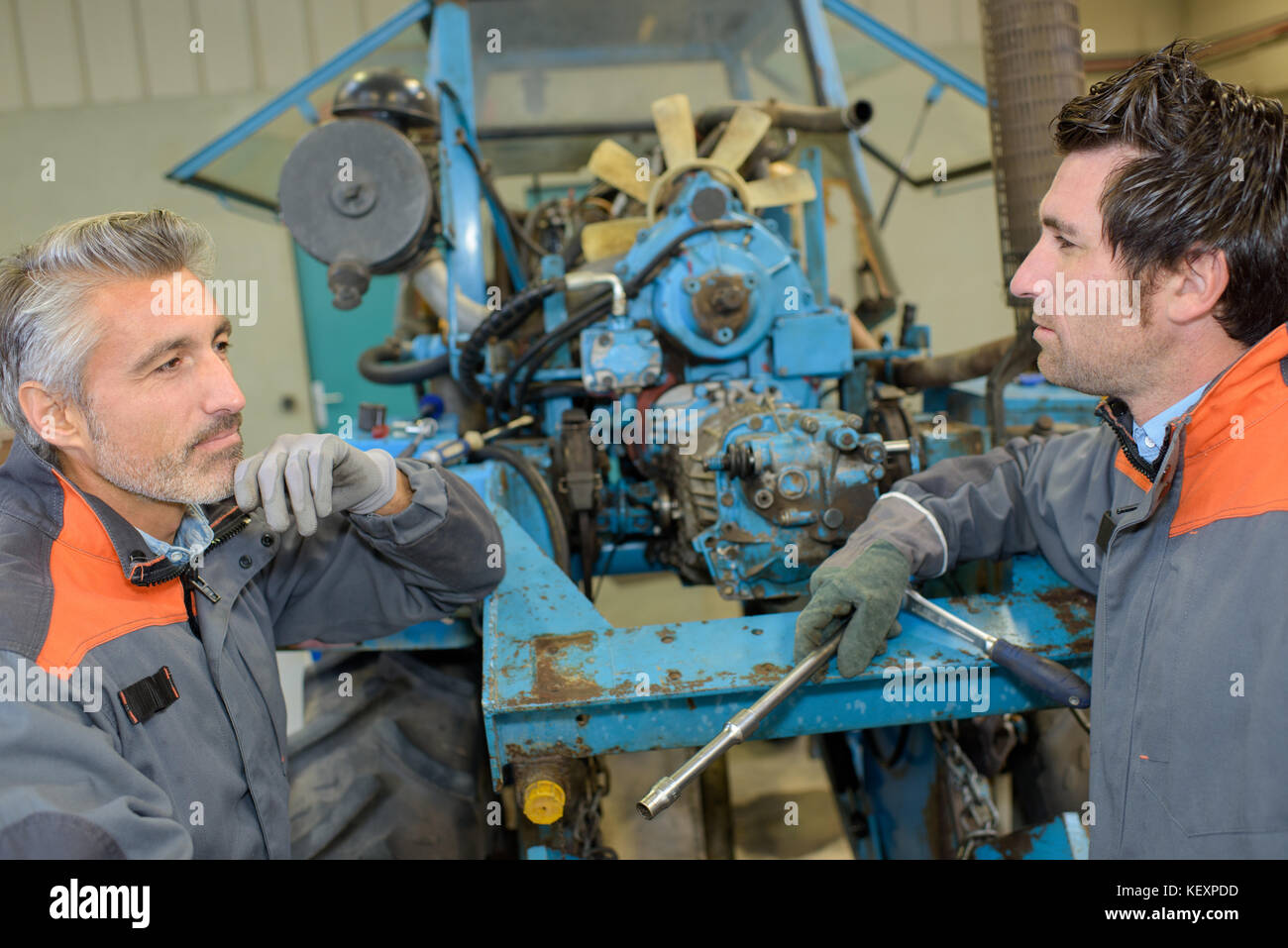 machinist fixing a machine Stock Photo - Alamy