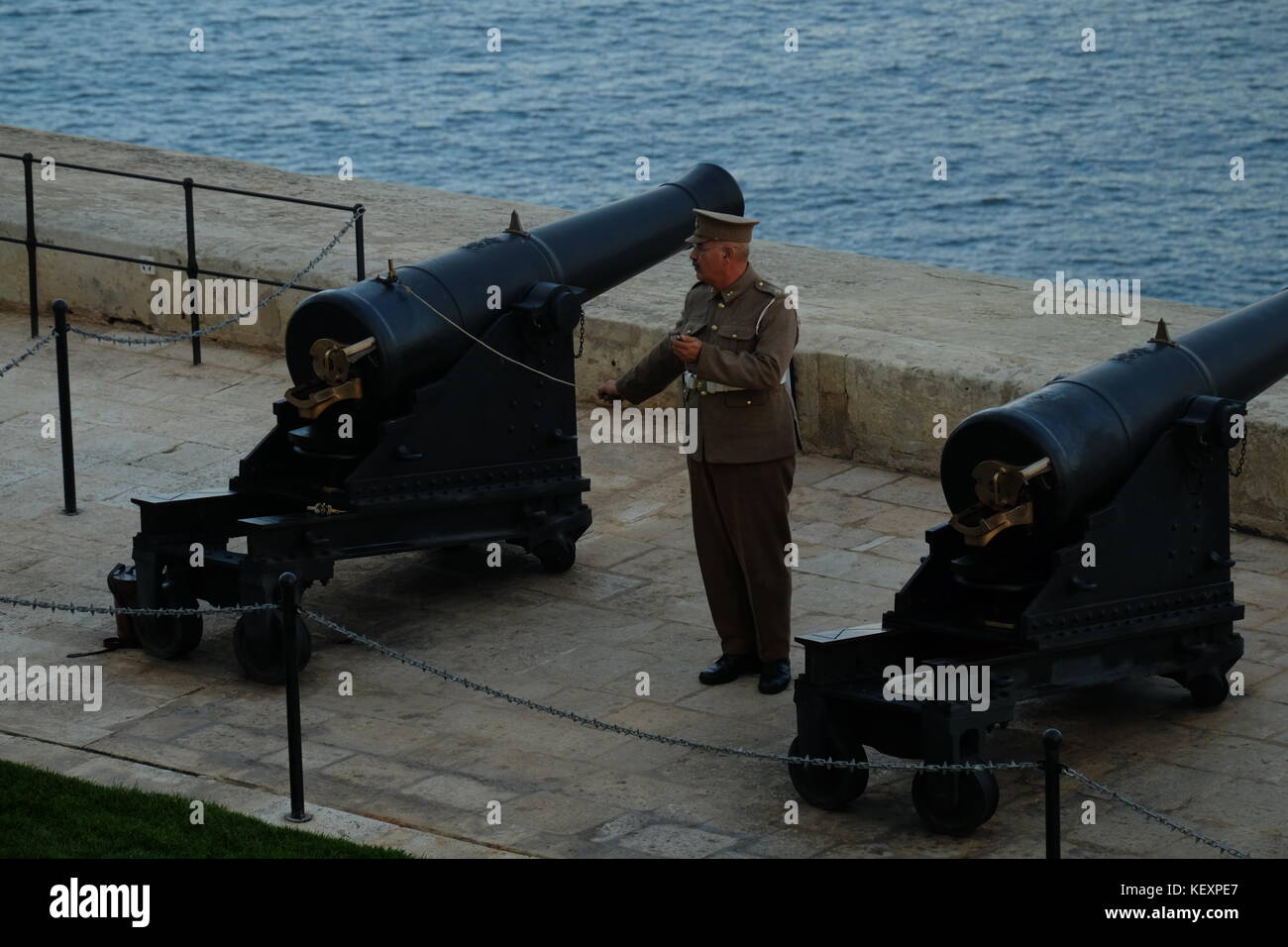 Soldier Firing the Guns at 4pm at the Saluting Battery, Valletta, Malta ...