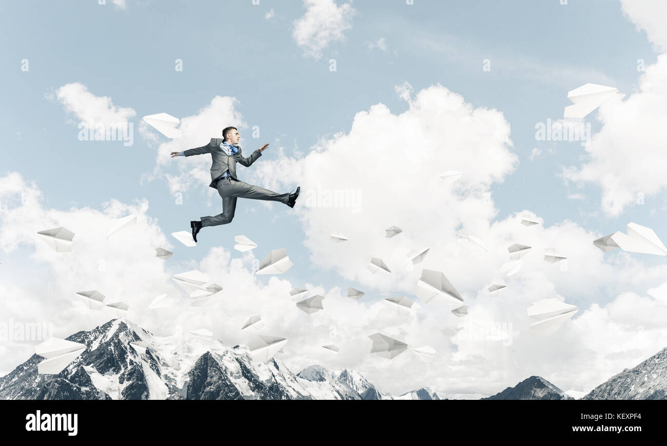 Businessman on the move Stock Photo - Alamy