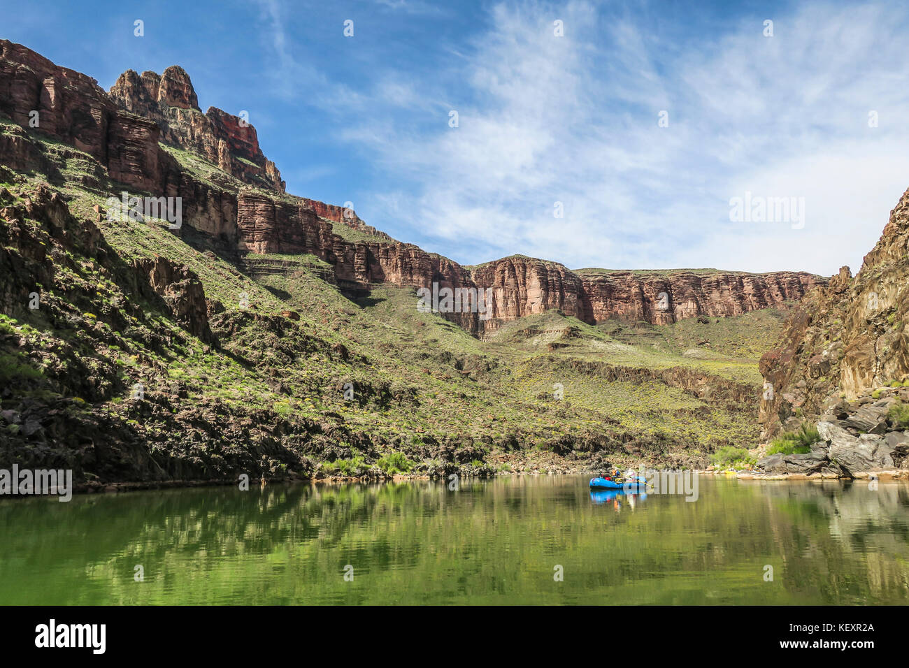 Majestic scenery of Grand Canyon with people rafting on Colorado River ...