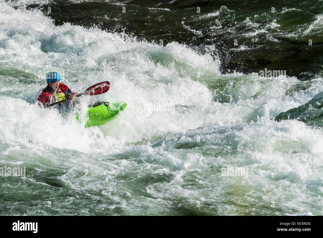 Kayaker paddling on white water in Snake River, Jackson Hole, Wyoming ...