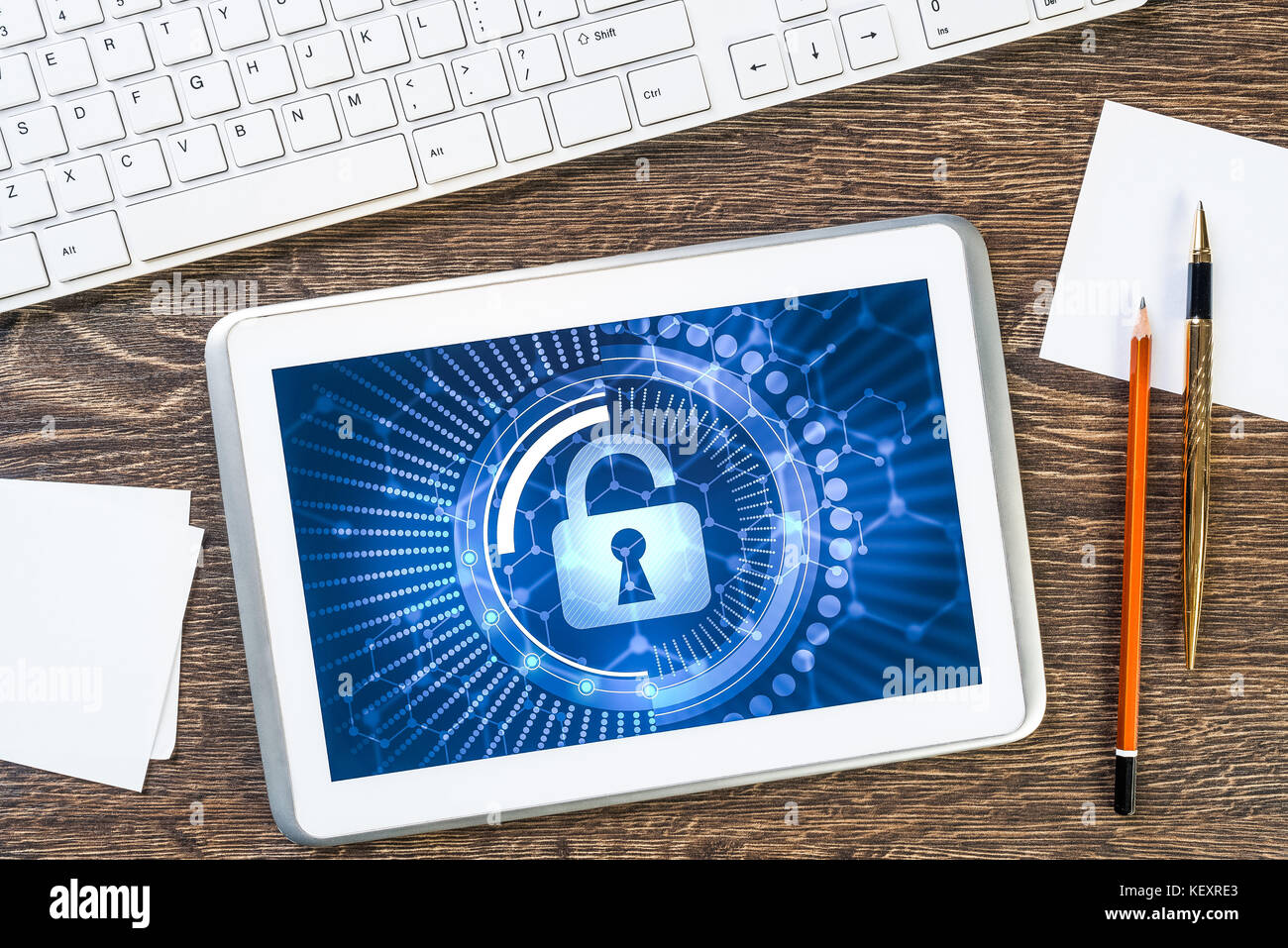 Business workplace with tablet pc and security concept on screen Stock ...