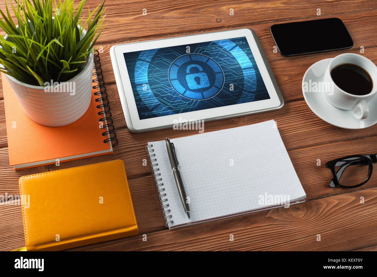 Web security and technology concept with tablet pc on wooden table ...
