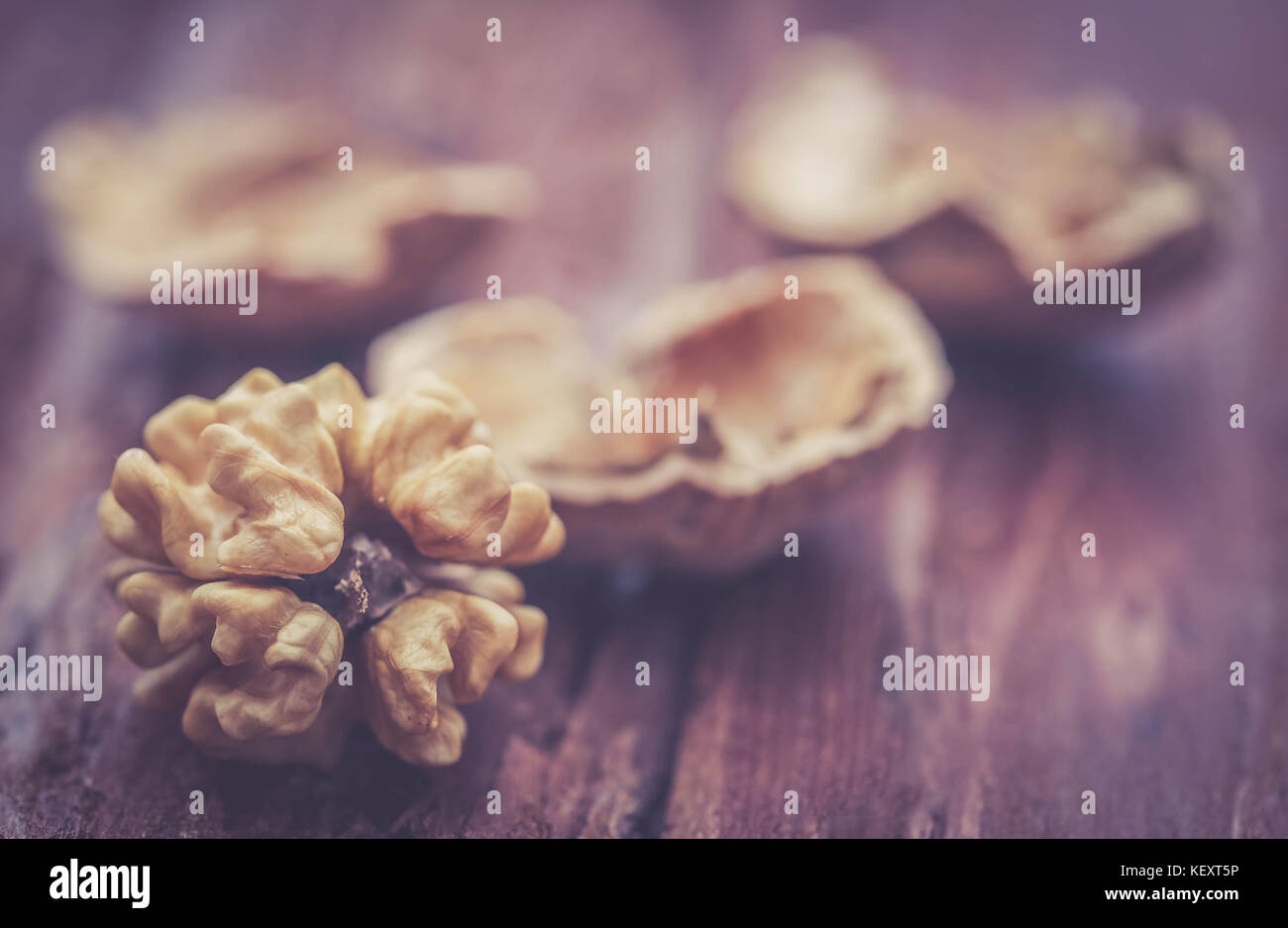 Walnut closeup on natural surface Stock Photo - Alamy