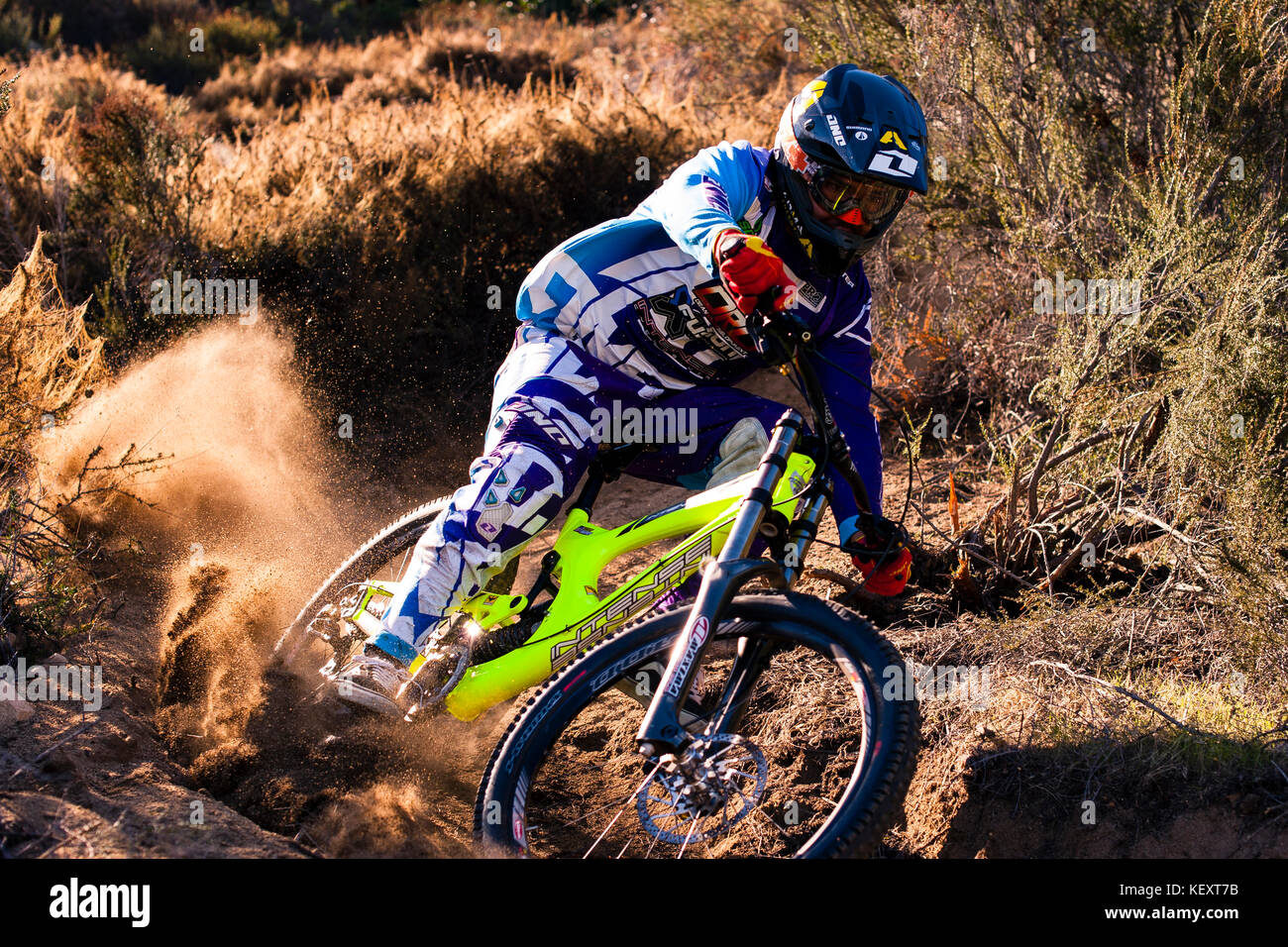 Cody Warren finds traction in a turn while riding his Downhill bike in ...