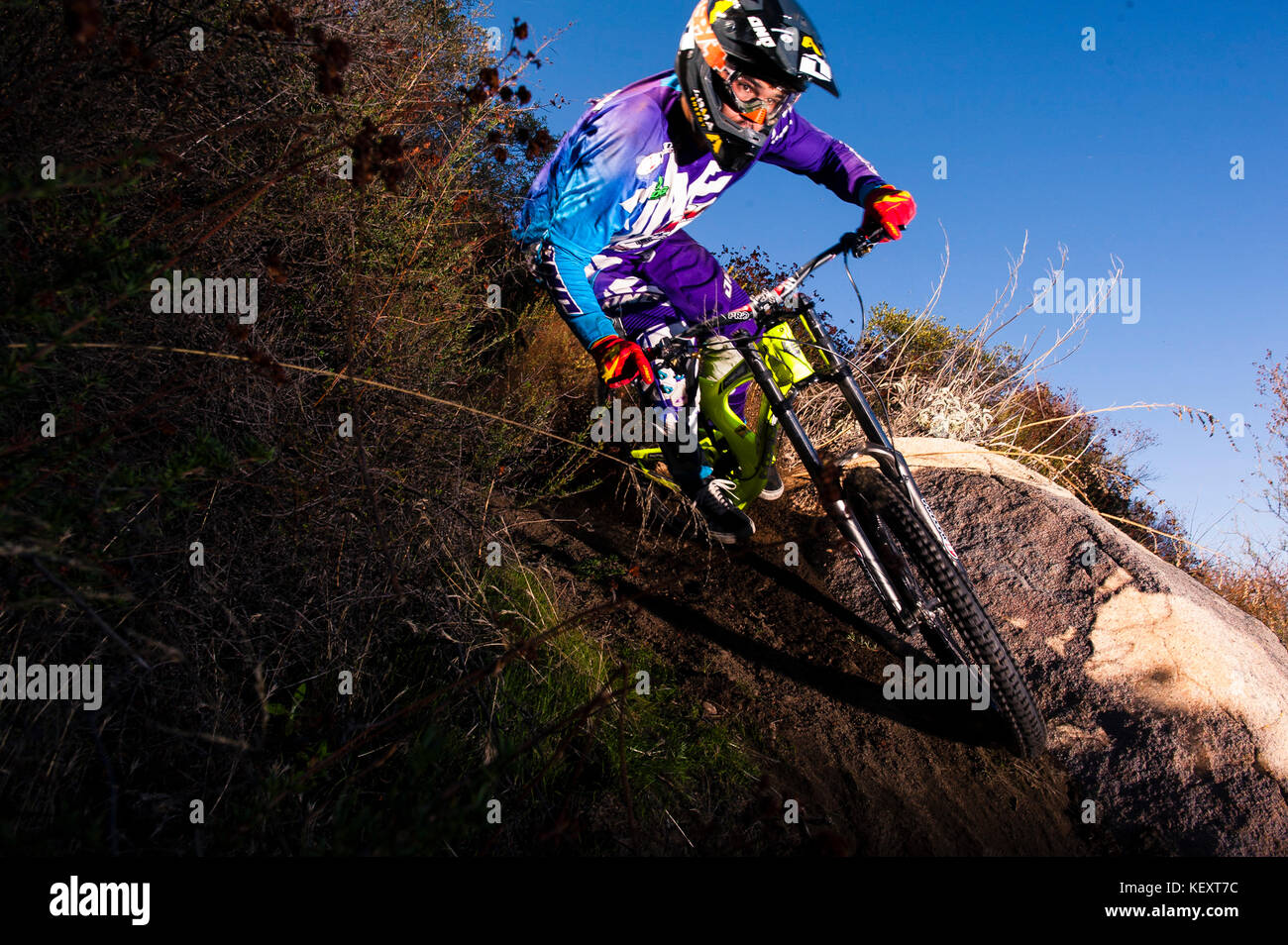 Cody Warren uses a rock to finds traction in a turn while riding his ...