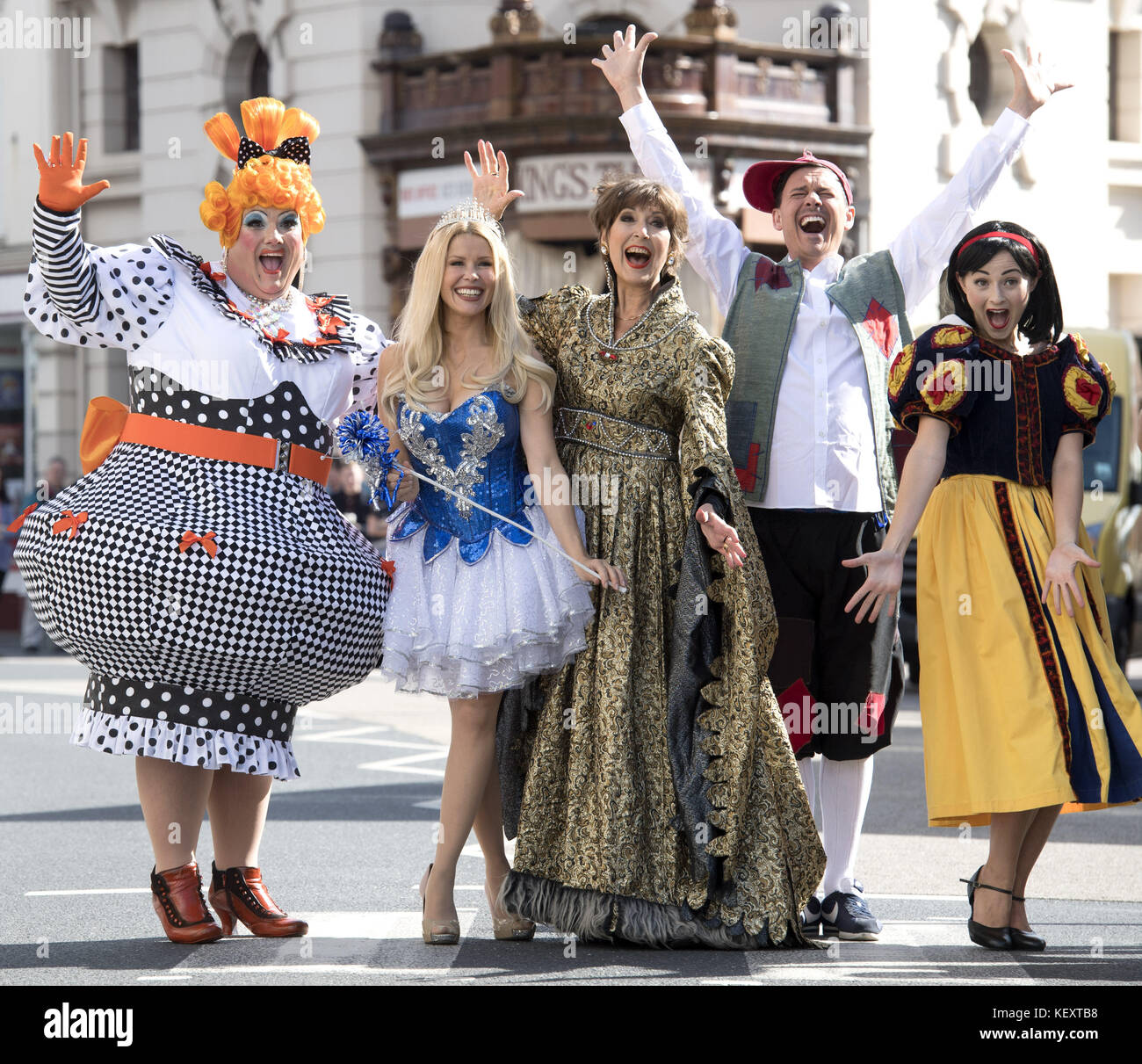 Performers pose for the launch of a pantomime 'Snow White' at Kings ...