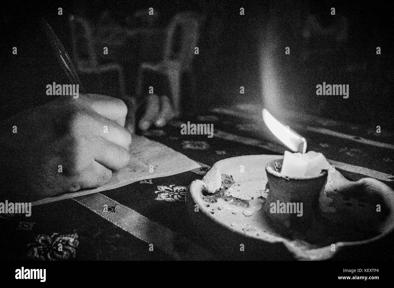 hand writing a letter by Candlelight Stock Photo - Alamy