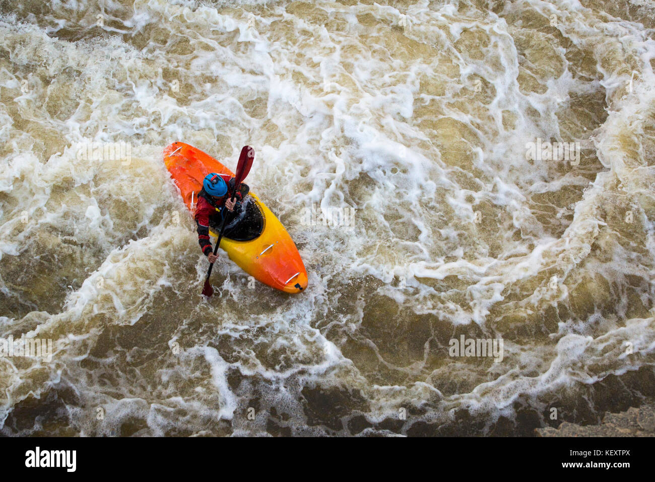 View from above of person sitting in kayak on Provo River, Uinta ...