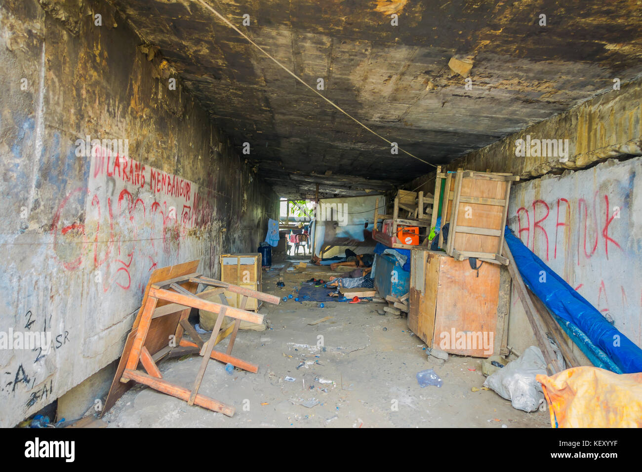 JAKARTA, INDONESIA - MAY 06, 2017: Homeless people sleeping and living ...