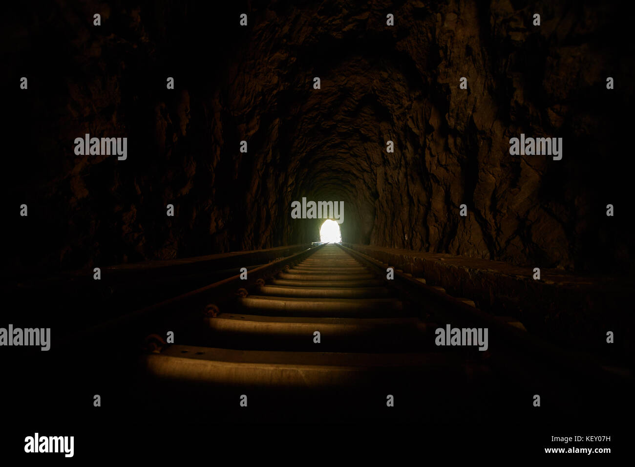 Exit from darknes - Light at end of tunnel, Shadow of people Standing ...
