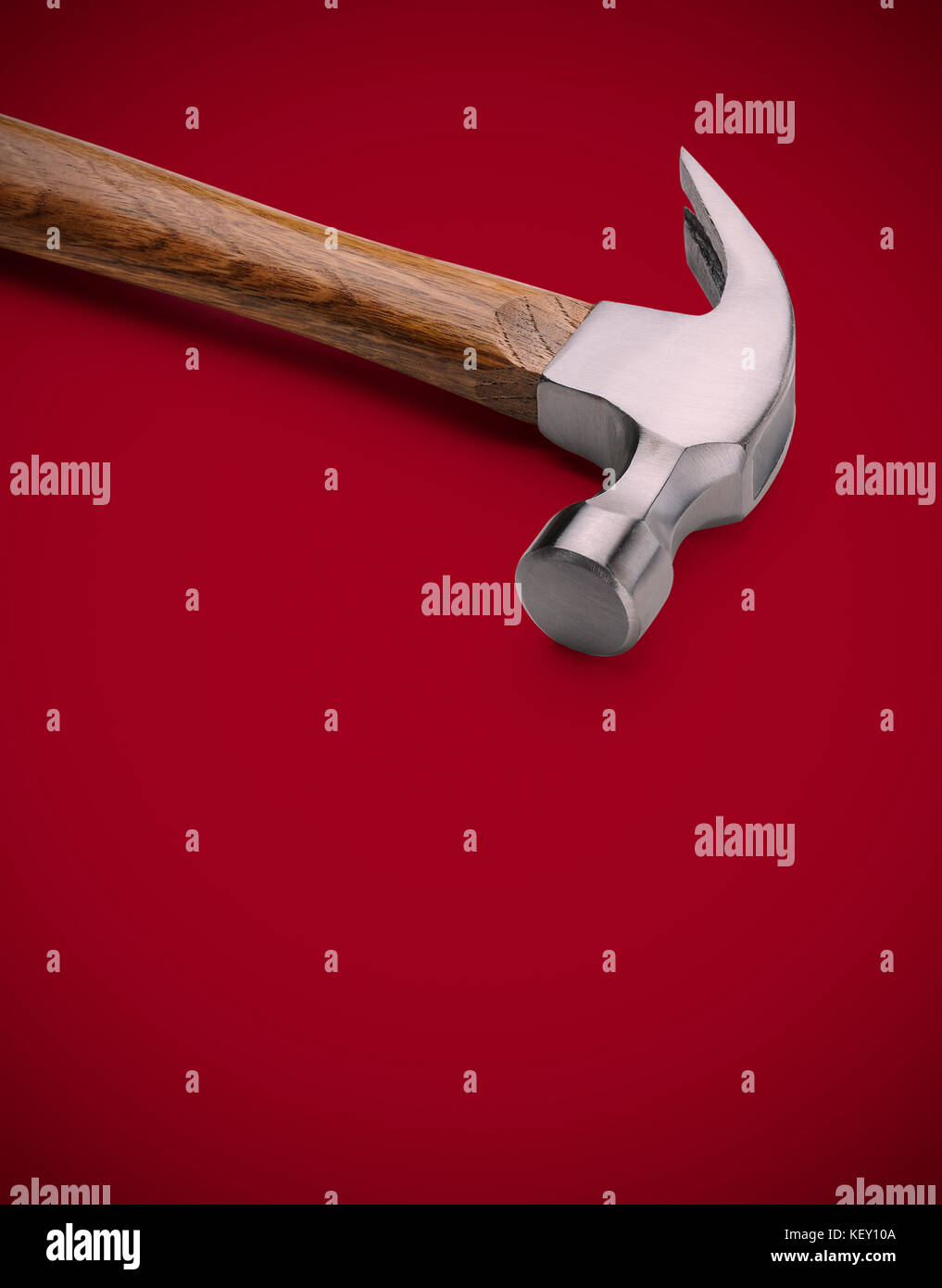 Claw hammer for construction on red background Stock Photo - Alamy