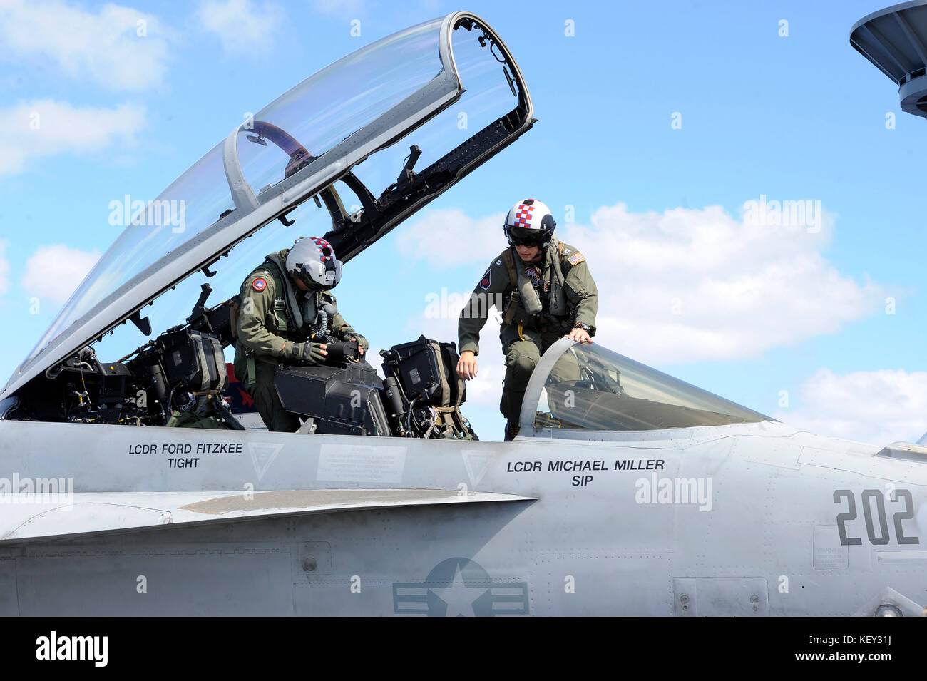 Pilots getting into F/A-18 Super Hornet Stock Photo - Alamy