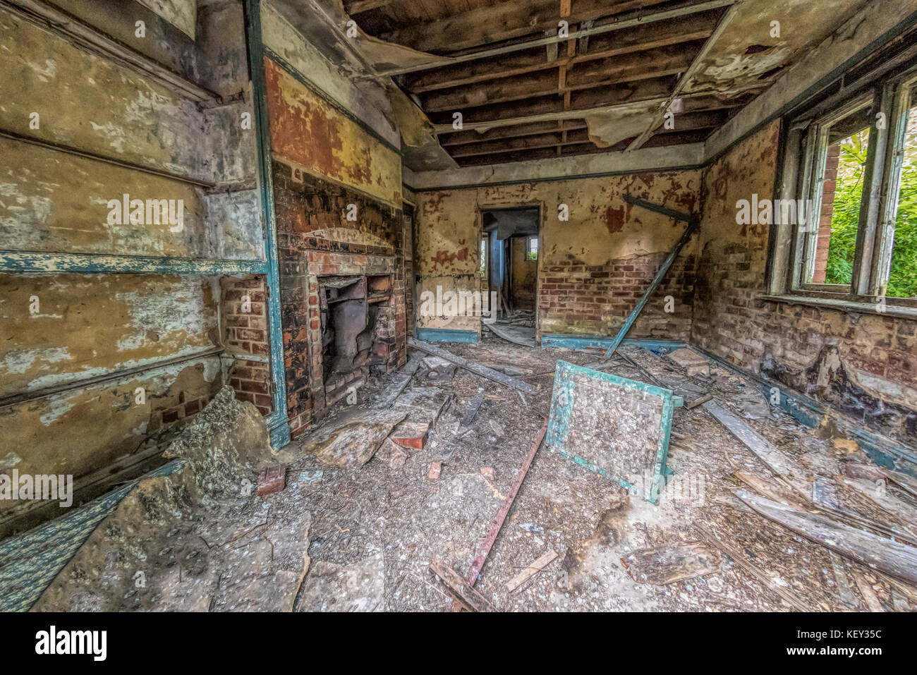 A derelict property abandoned and deserted in a state of dis repair ...