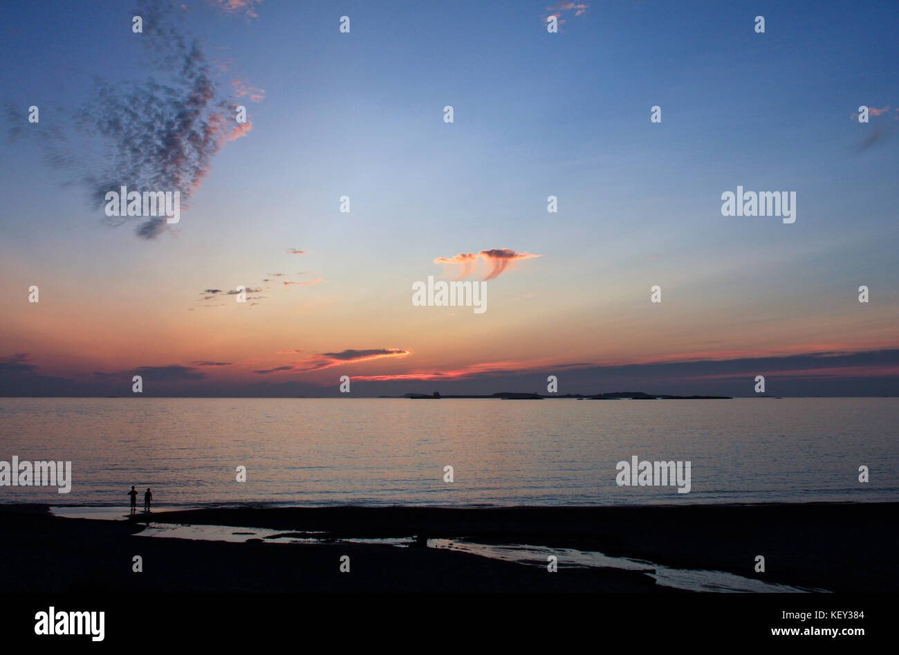 Sunset, nightfall or twilight by the North Sea in July. Shore this side ...