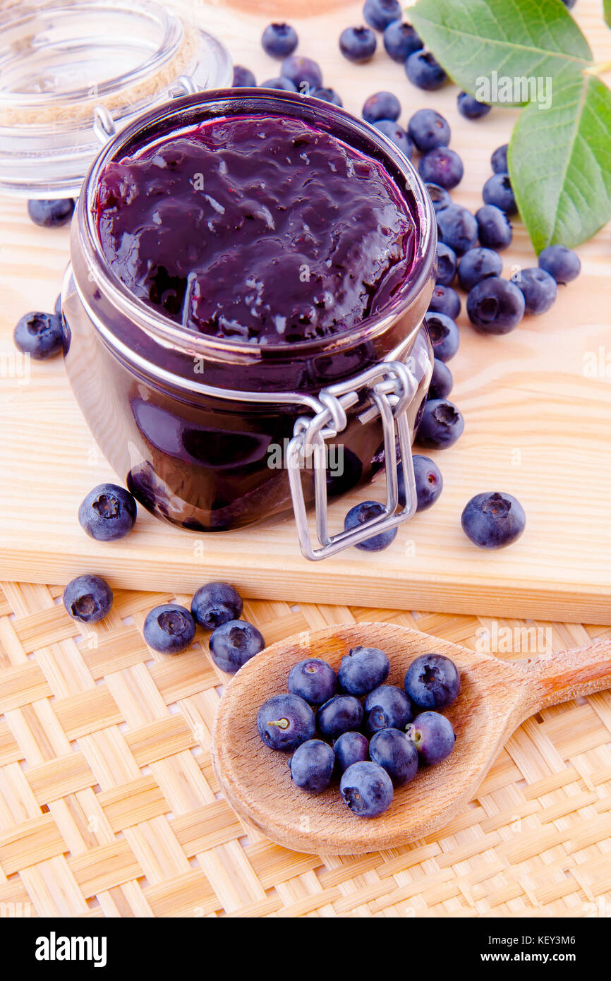 Blueberry fruits jam in the kitchen on the table Stock Photo - Alamy