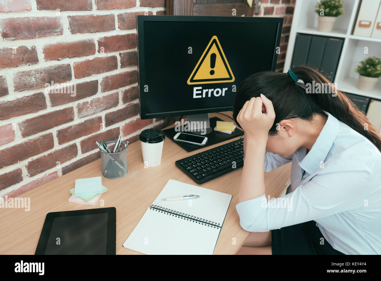 high angle photo of office computer getting mistake problem showing ...