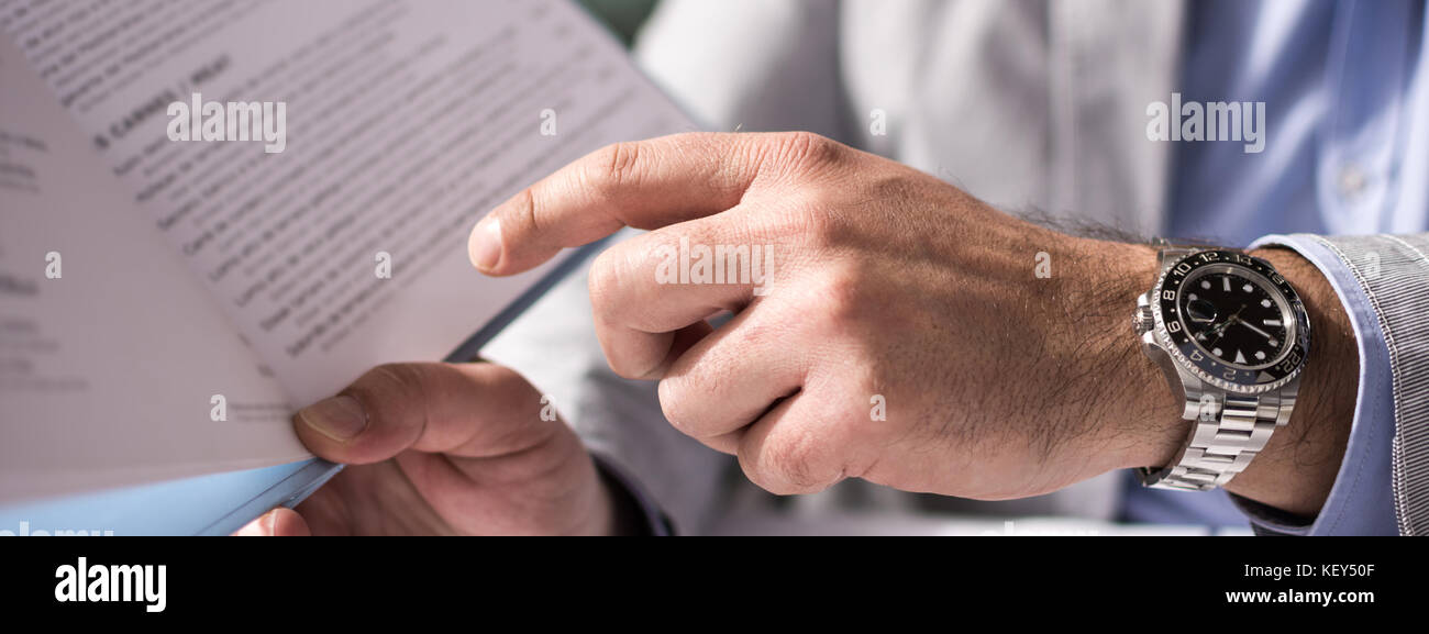 Male Hand Holding Restaurant Menu to Make Order for Lunch Stock Photo ...