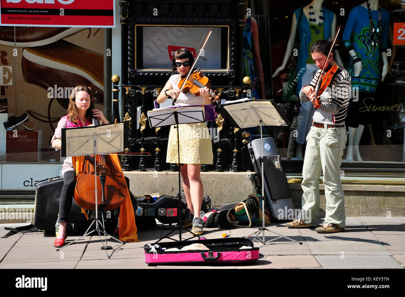 Buskers in Bath, a trio of classical string musicians entertain the ...