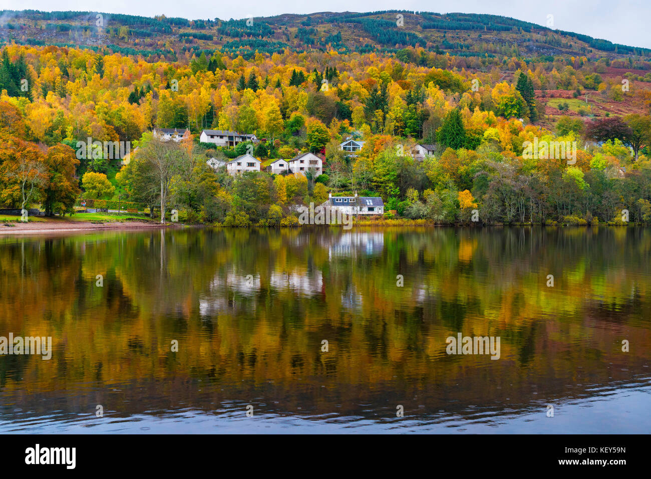 View of waterfront at village of Kenmore during autumn on Loch Tay in ...