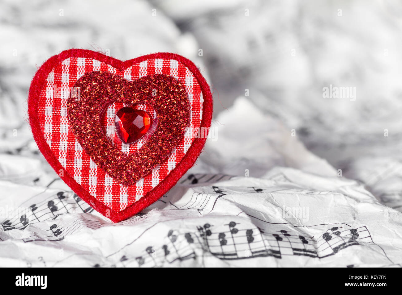 Red heart with music notes, conceptual image Stock Photo - Alamy