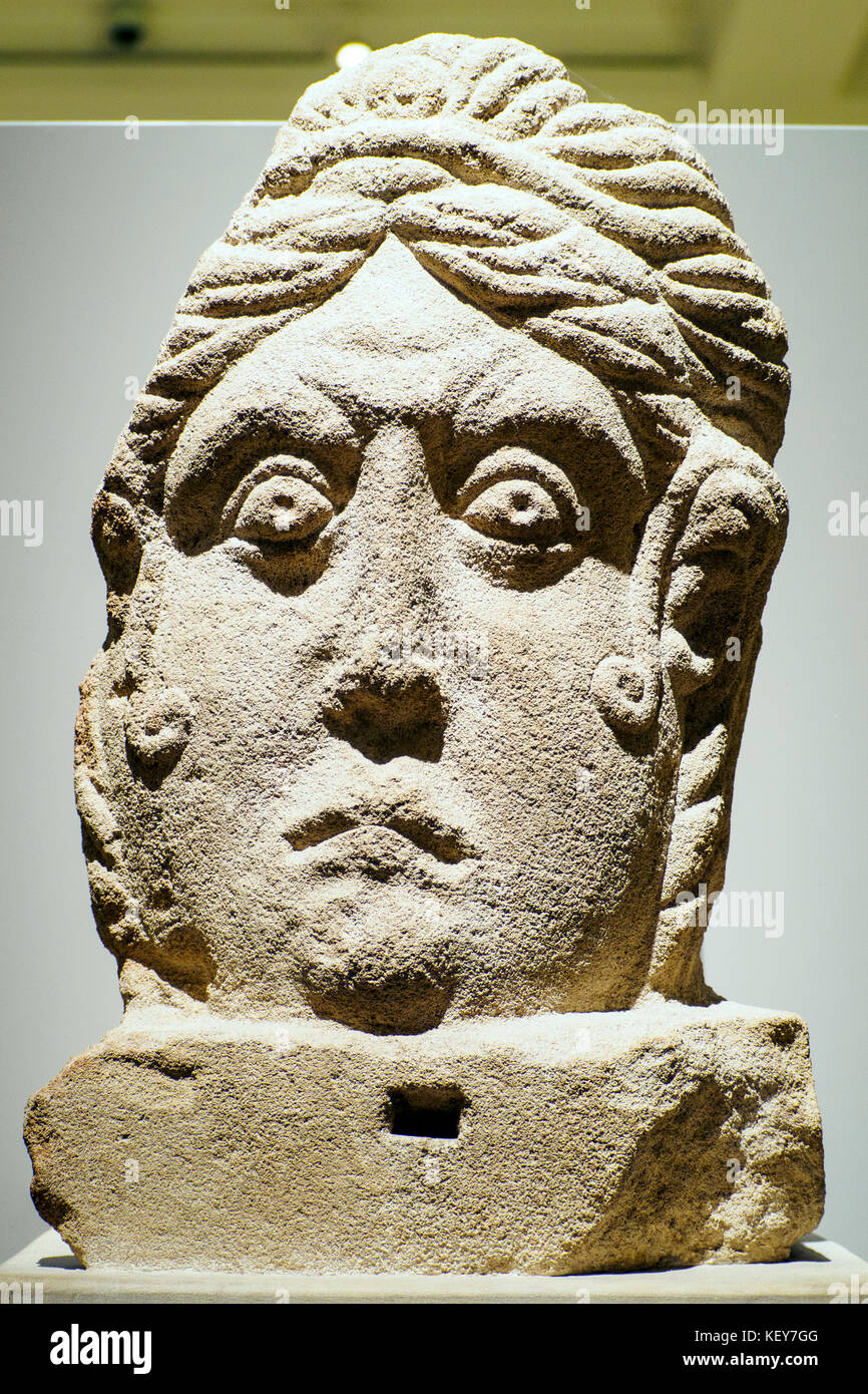 Limestone head Towcester, Northamptonshire The head is a fusion of ...