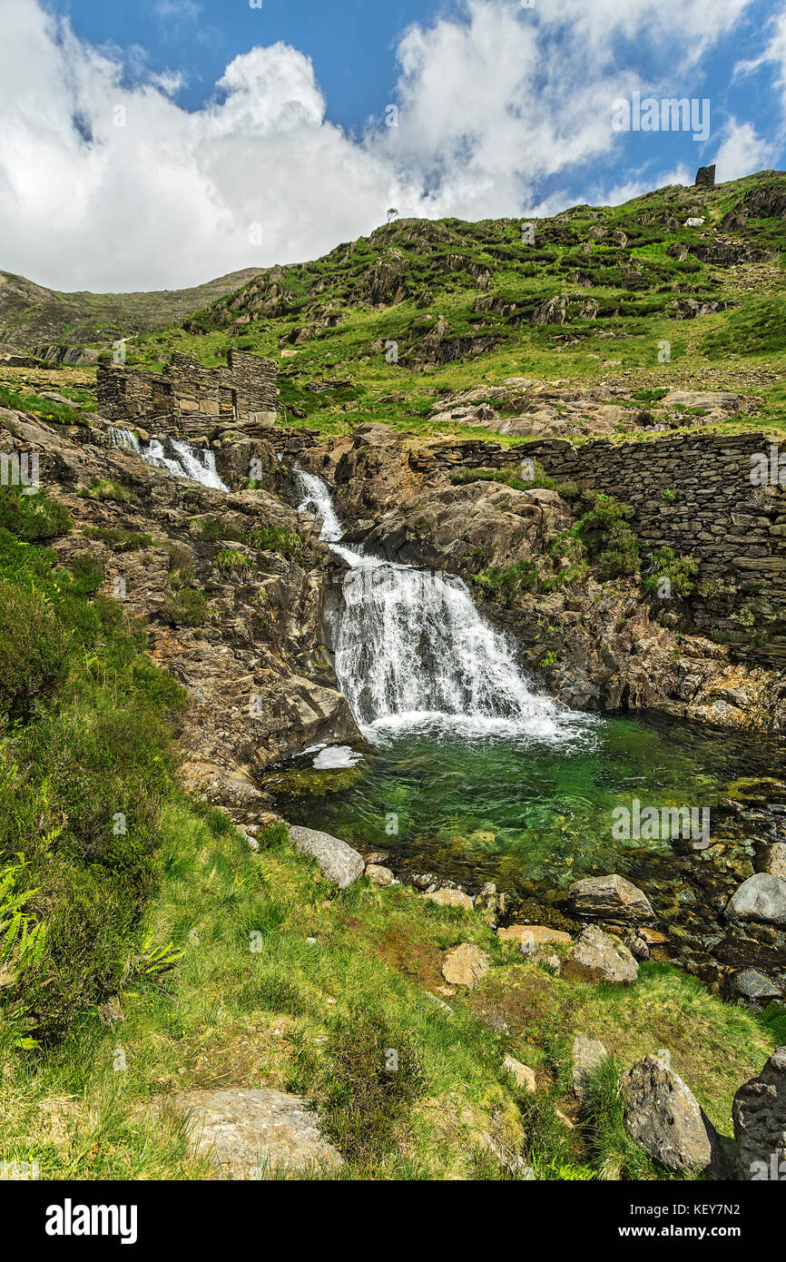 Waterfalls on Afon (River) Cwm Llan and an old slate quarry building ...