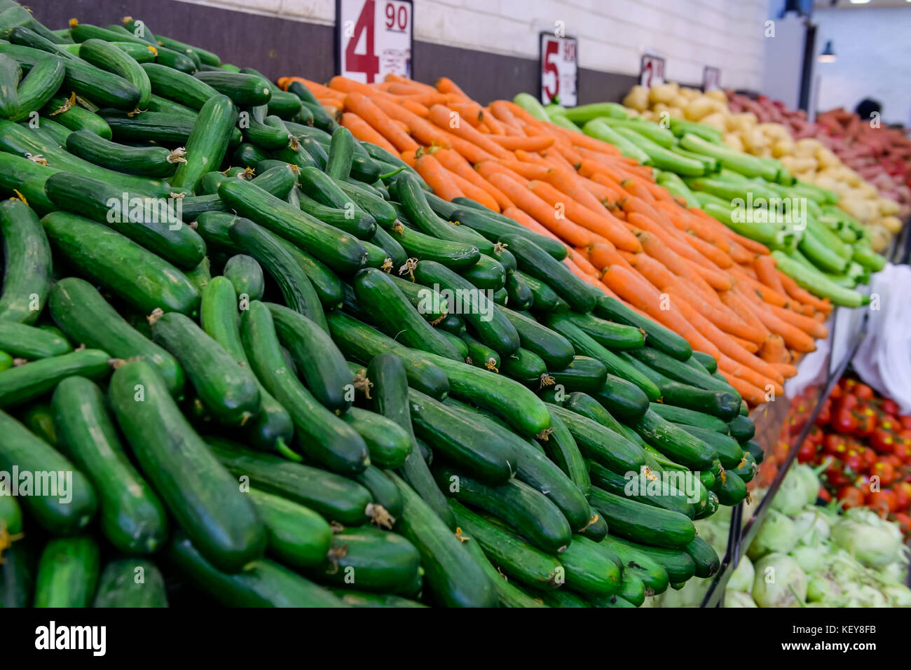 Close up Fresh vegetables at the counter of the vegetable shop, farmer ...