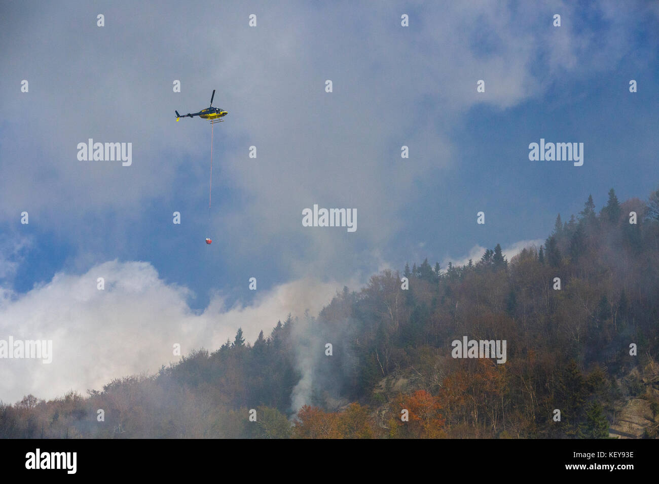 Smoke from a forest fire on Dilly Cliff in Kinsman Notch New Hampshire ...