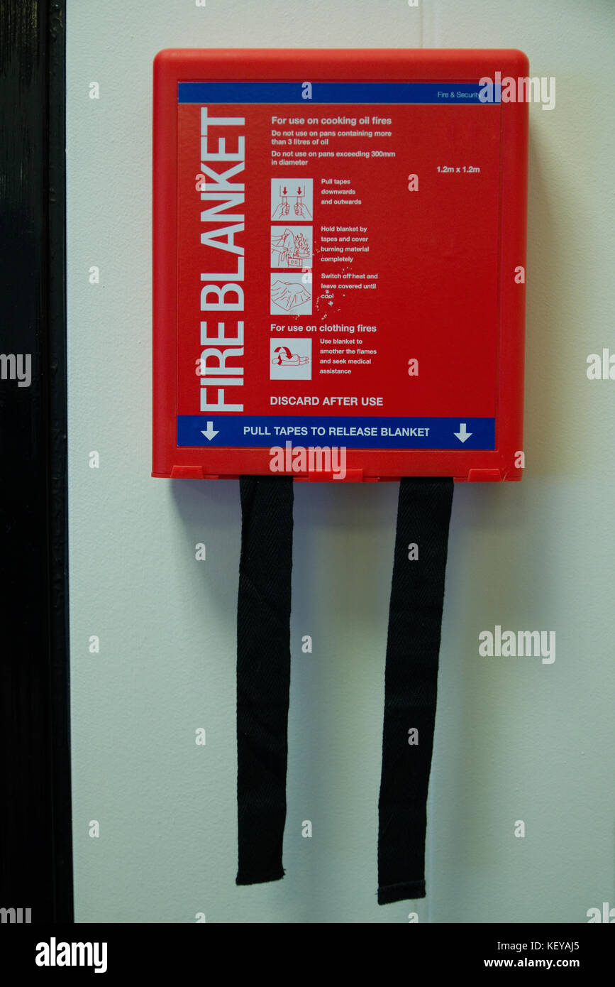 Red fire safety blanket Stock Photo - Alamy