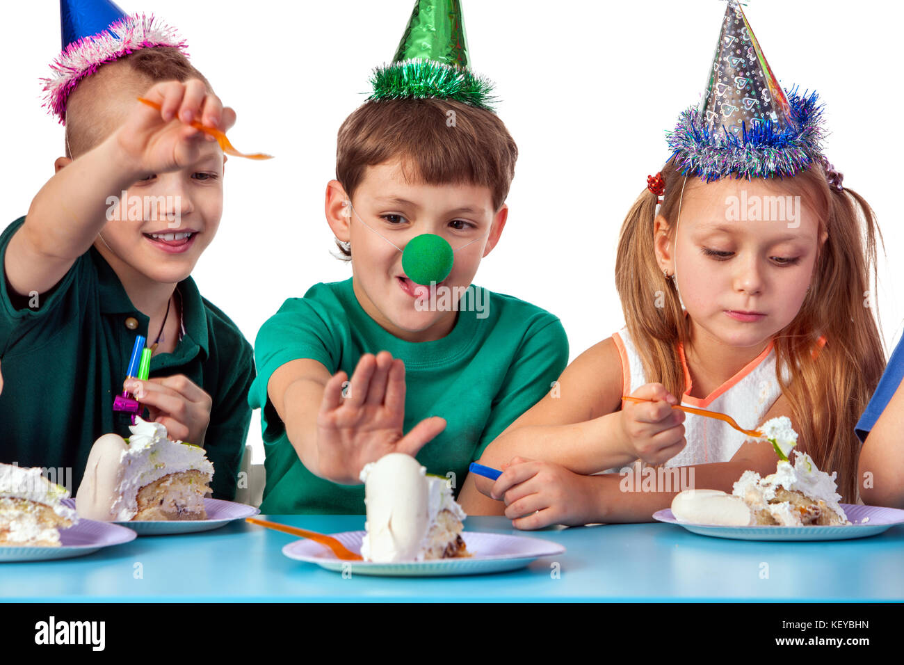 Group of children eating cake hi-res stock photography and images - Alamy