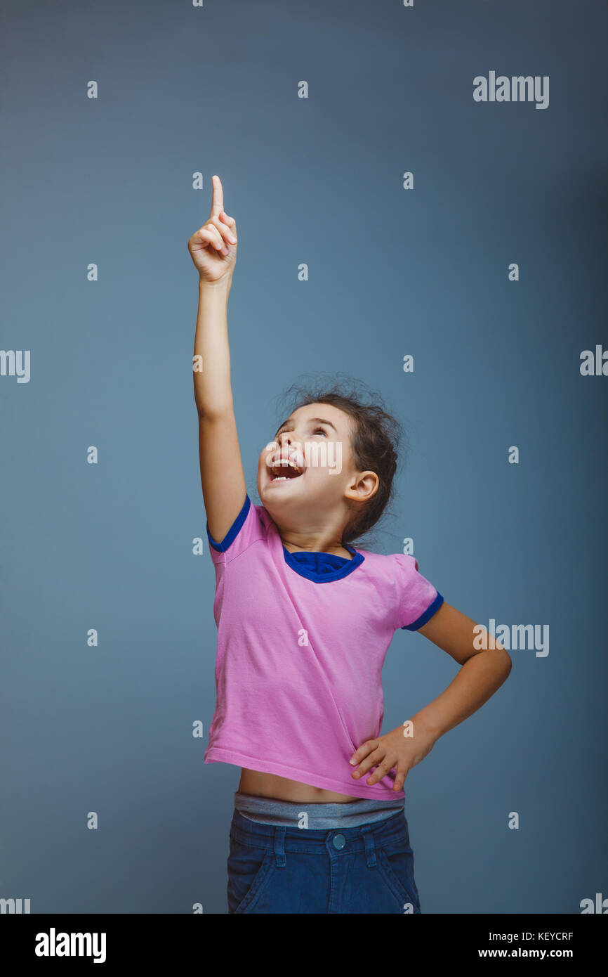 Girl screams raising his hand up Stock Photo - Alamy
